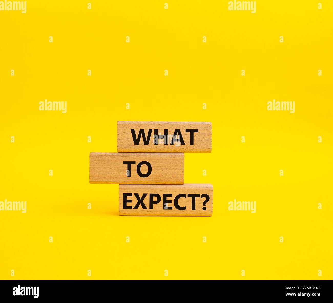 What to Expect symbol. Concept words What to Expect on wooden blocks ...