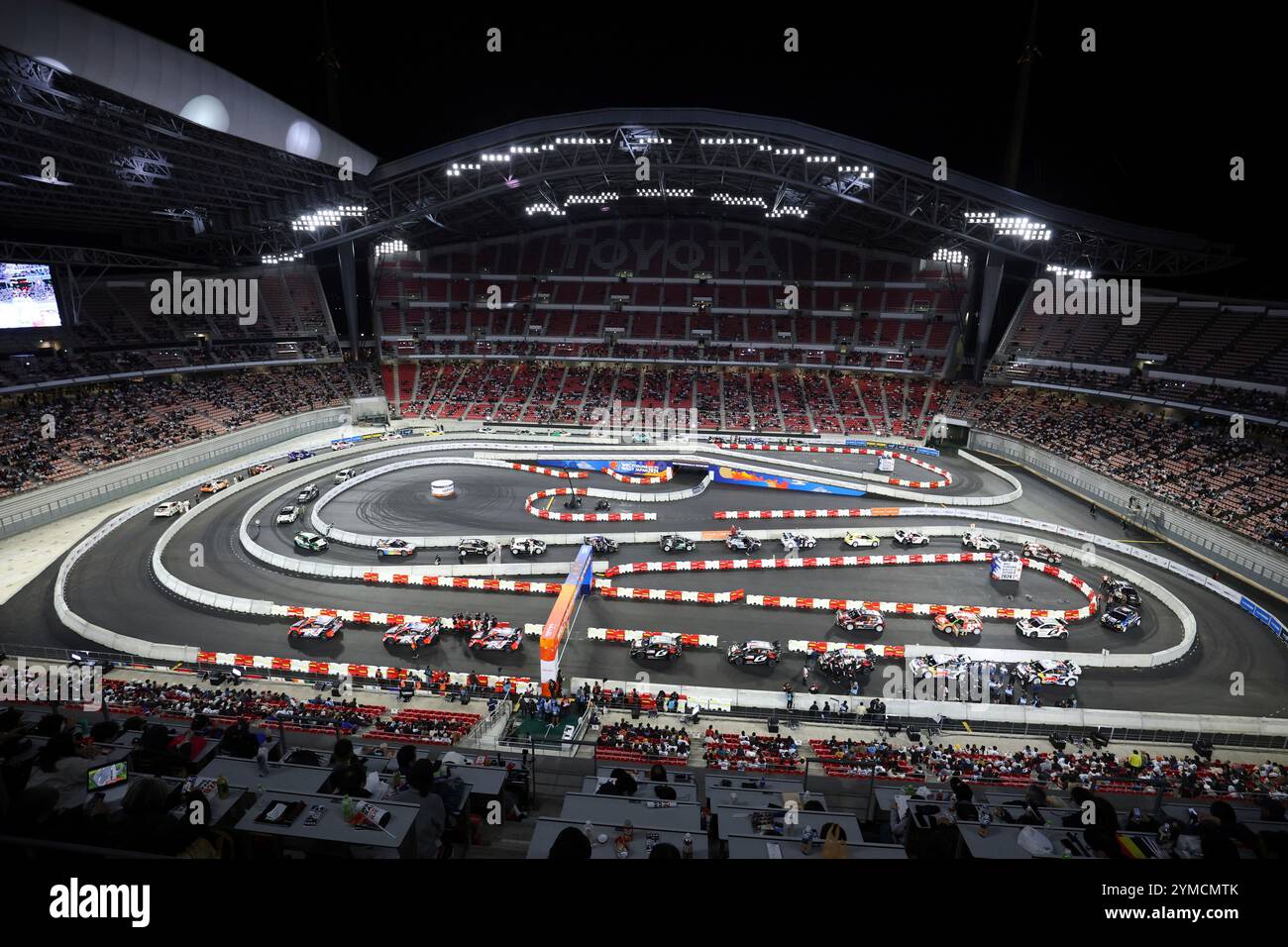 Rally cars are lined on the circuit before a ceremonial start of WRC ...
