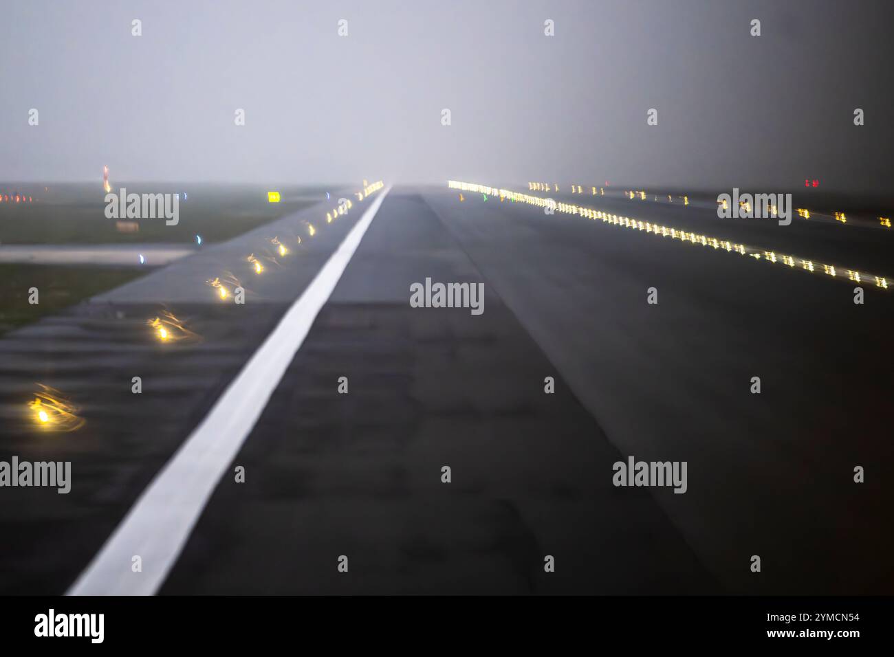 Blurred background with the lights at airport runway Stock Photo - Alamy