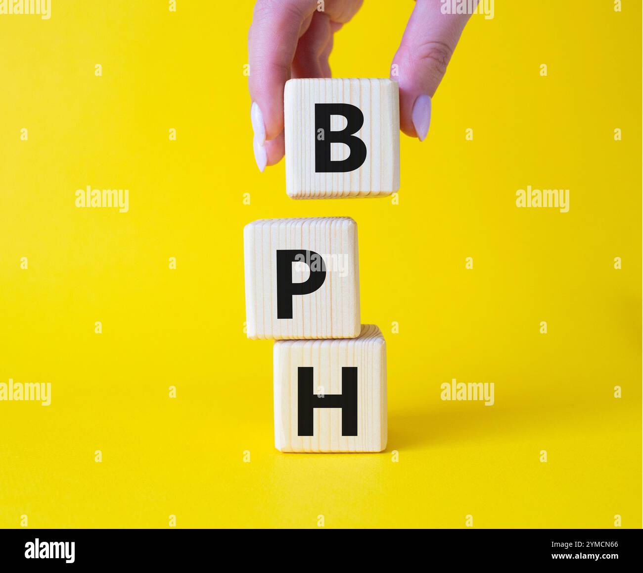 BPH - Benign Prostatic Hyperplasia symbol. Wooden cubes with word BPH ...