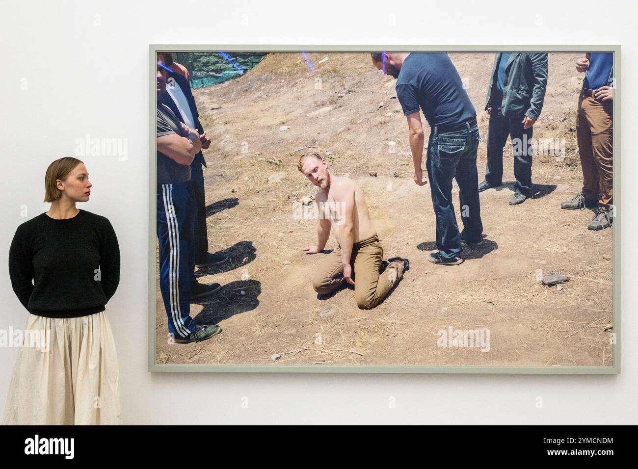 London, UK. 21 November 2024. A staff member with ‘Listener’, 2025, at ...