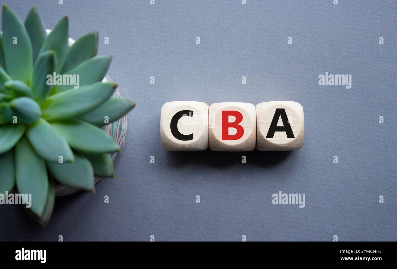CBA - Cost Benefit Analysis symbol. Wooden cubes with word CBA ...
