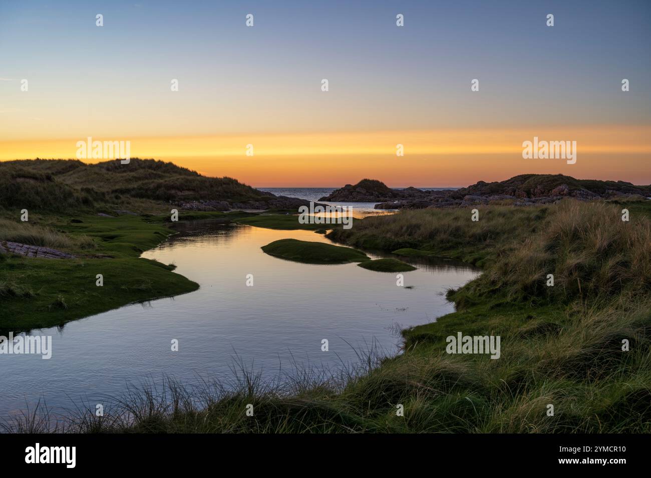 Sunset on river flowing into Red Rocks beach (Eilean Bhuigistile) on ...