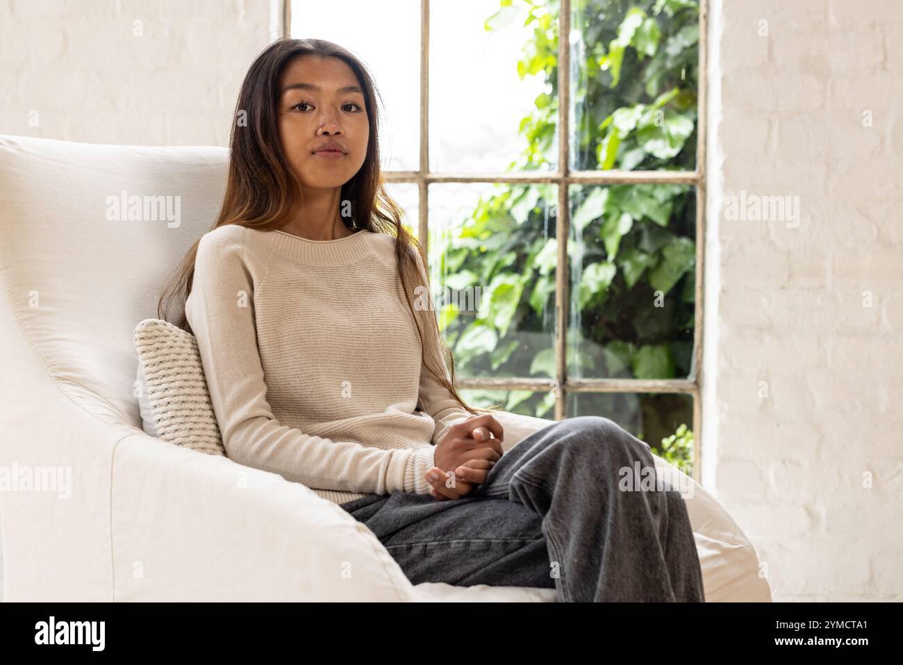Asian girl relaxing sitting window hi-res stock photography and images ...