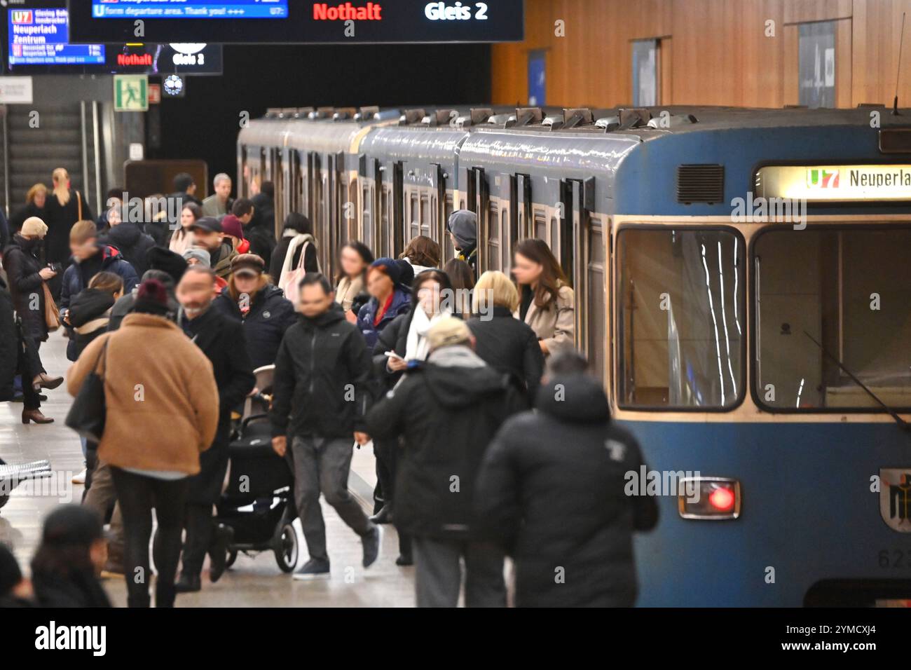 Munich, Deutschland. 21st Nov, 2024. The U7 subway train is arriving at the Wettersteinplatz ...