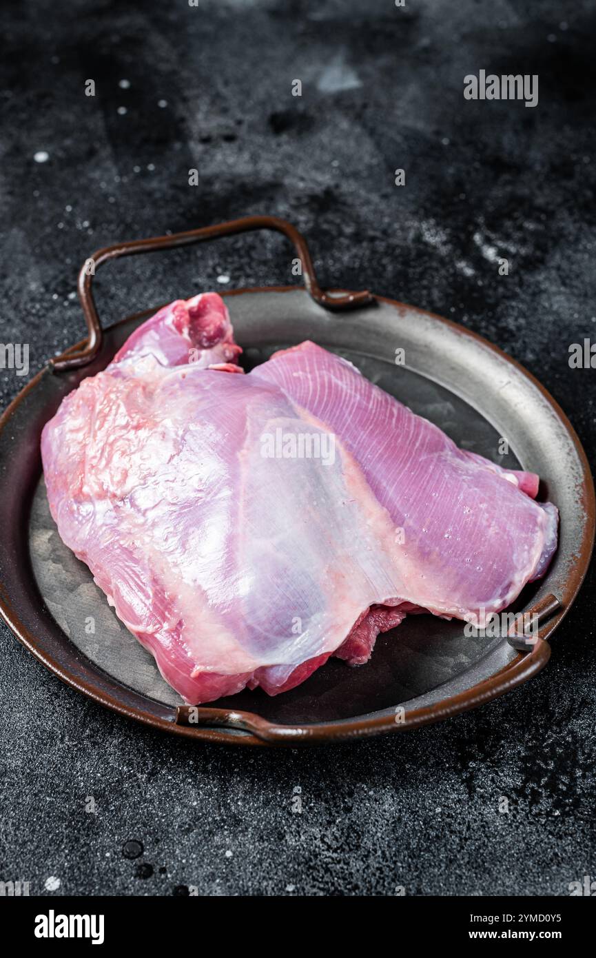 Raw Turkey boneless and skinless thigh fillet. Farm eco meat. Black ...