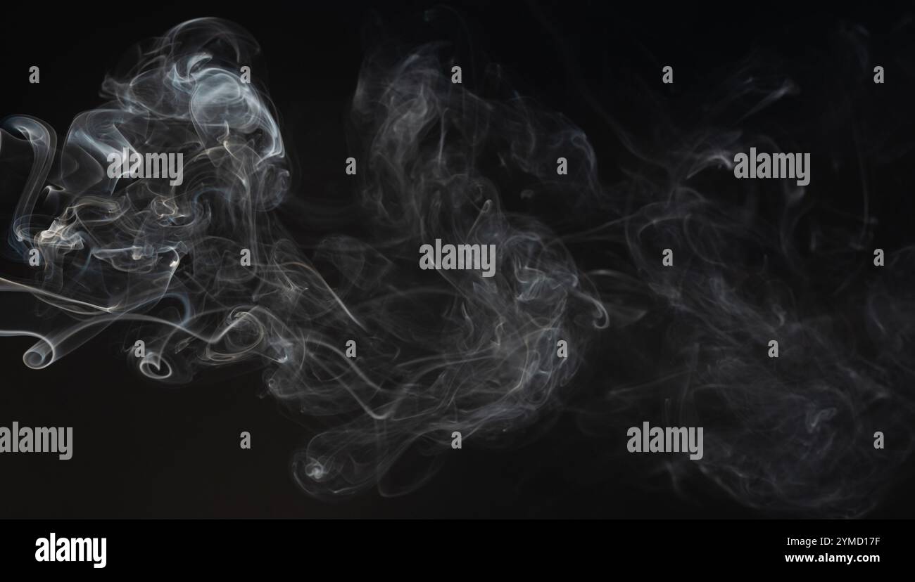 Gray smoke lines on black studio background Stock Photo - Alamy