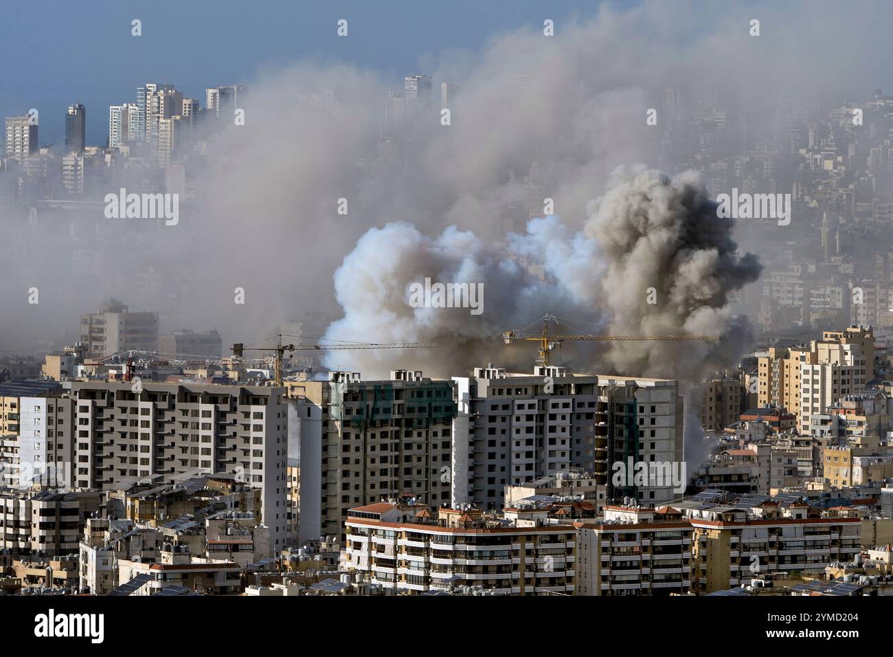 Smoke rises after an Israeli airstrike on Dahiyeh, in the southern ...