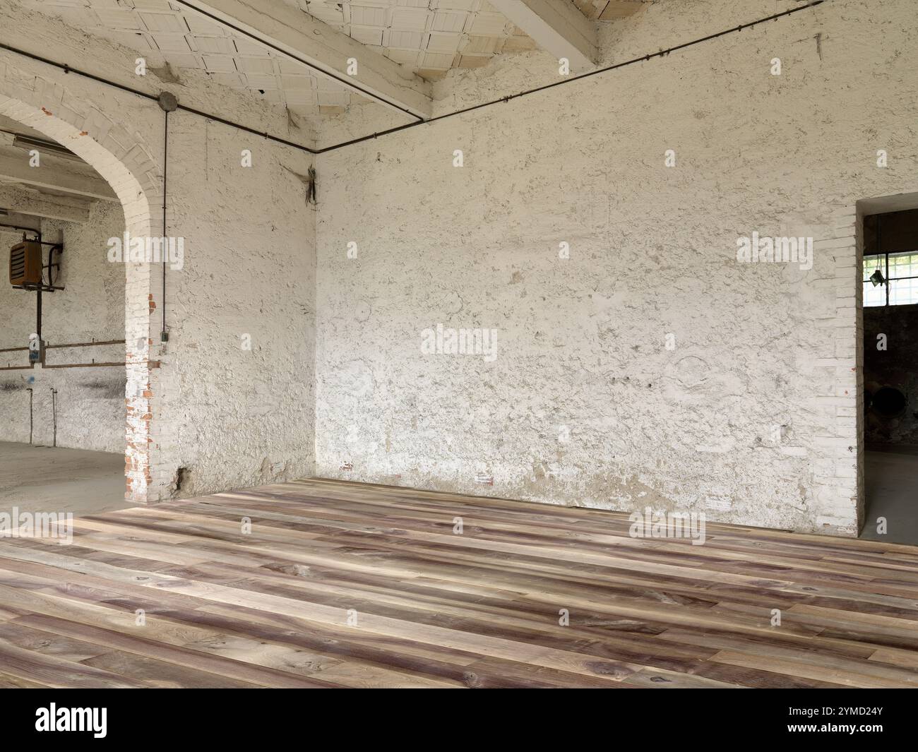 Interior of an empty room of an old abandoned building, with concrete ...