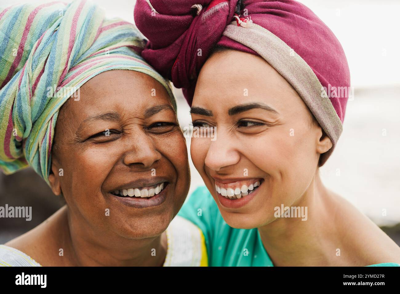 Happy african mother and daughter smiling on camera - Travel, ethnic ...