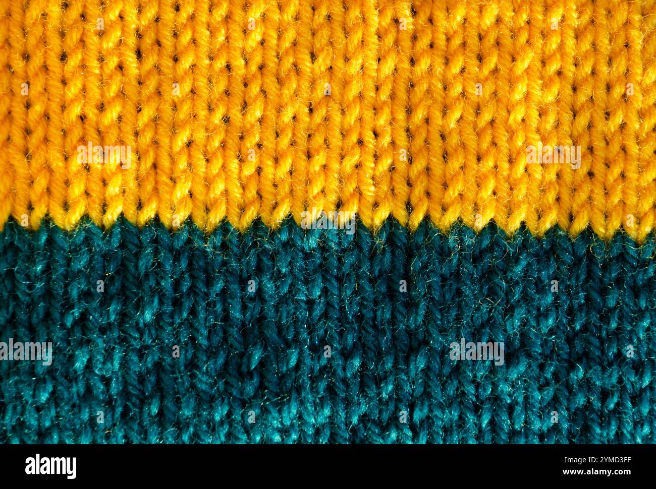 Crochet pattern texture from yellow wool blend yarn. Close-up sample of ...