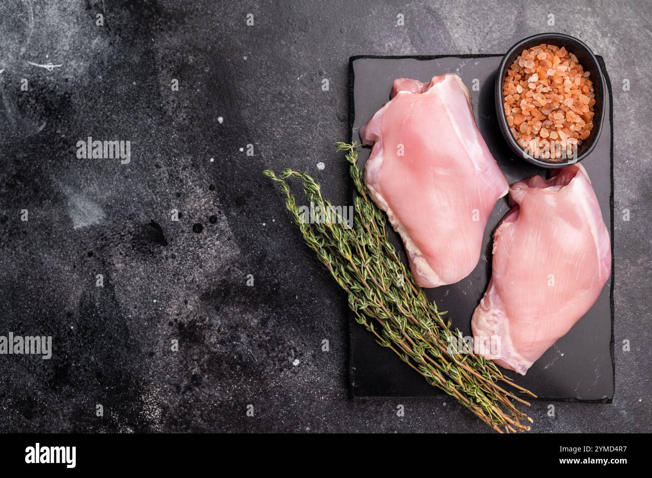 Fresh Raw chicken thigh fillet, Skinless boneless poultry meat. black ...