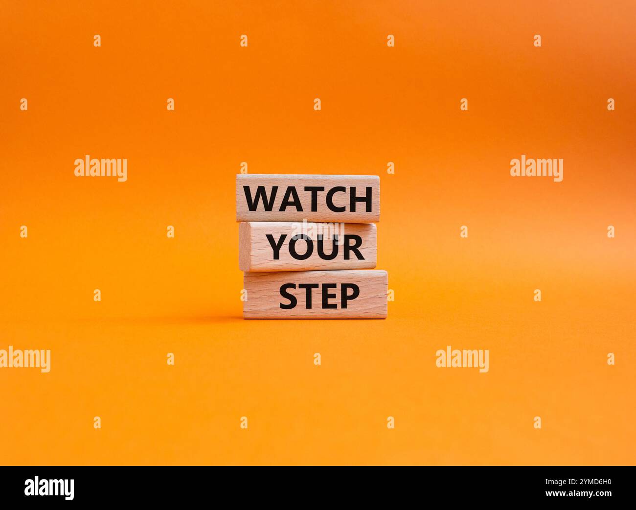 Watch your Step symbol. Concept words Watch your Step on wooden blocks ...