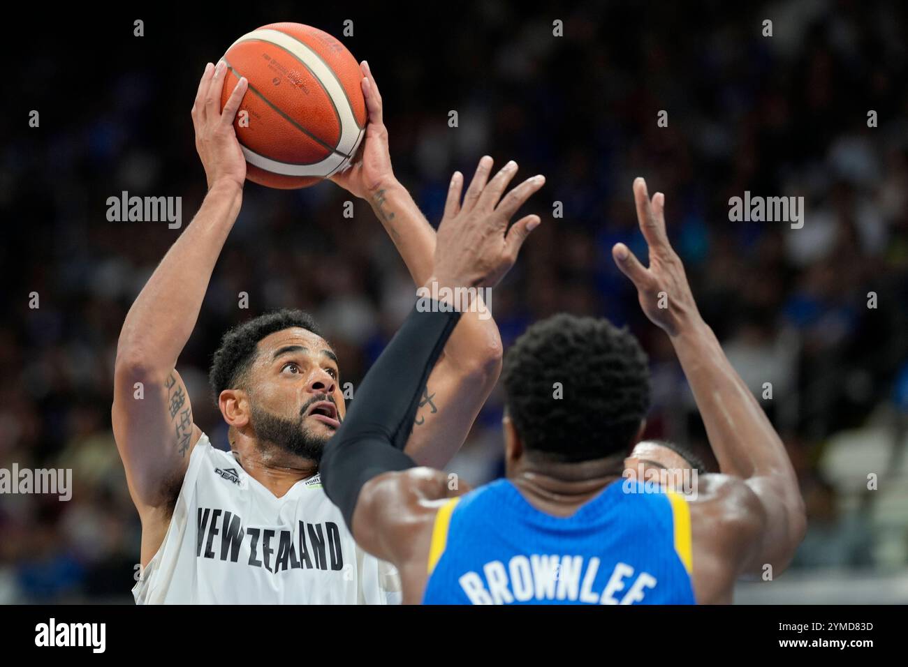 New Zealand's Corey Webster tries to shoot past Philippines' Justin ...