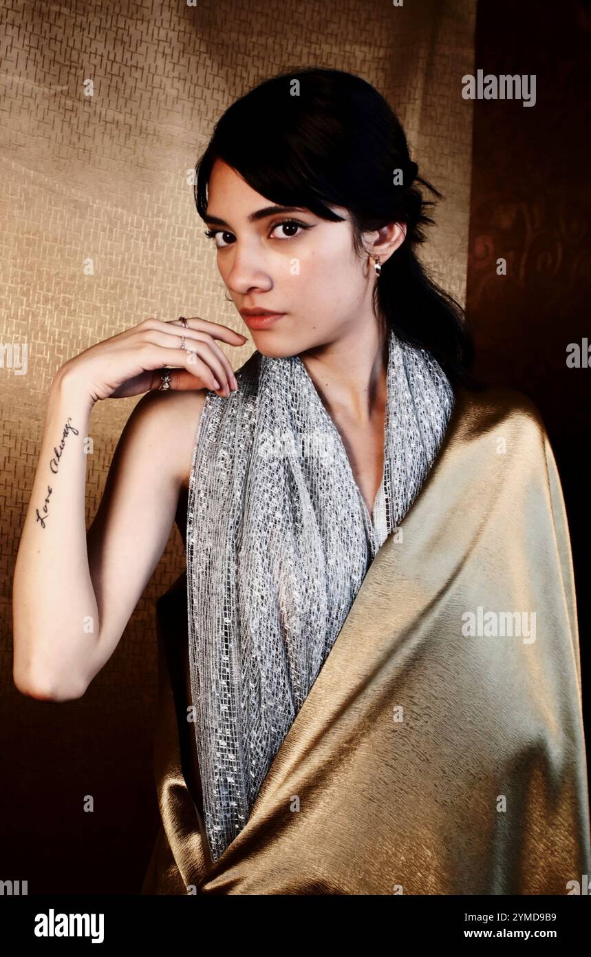 Emotive portrait of a young woman with natural light, capturing raw ...