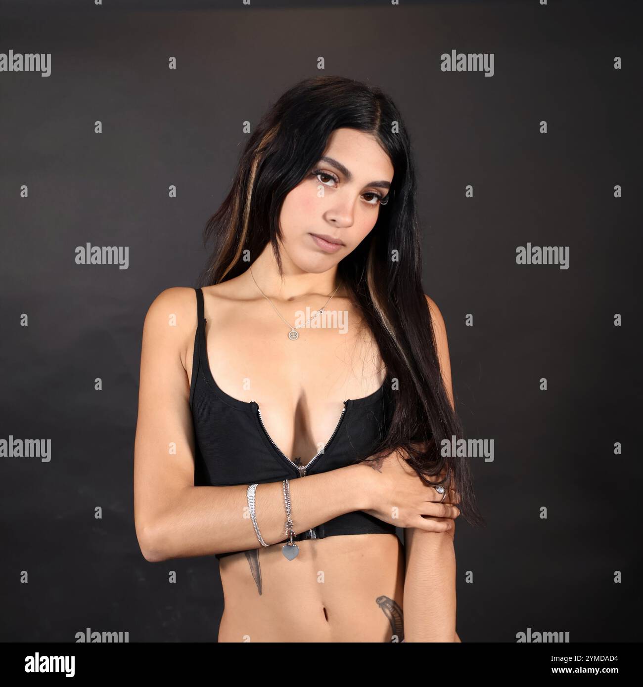 Emotive portrait of a young woman with natural light, capturing raw emotions and subtle details ...