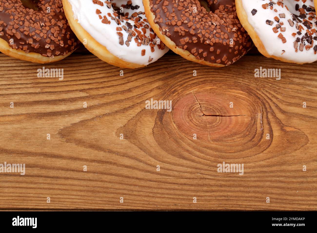 Enjoy these Delicious Donuts beautifully arranged on a Rustic Wood ...