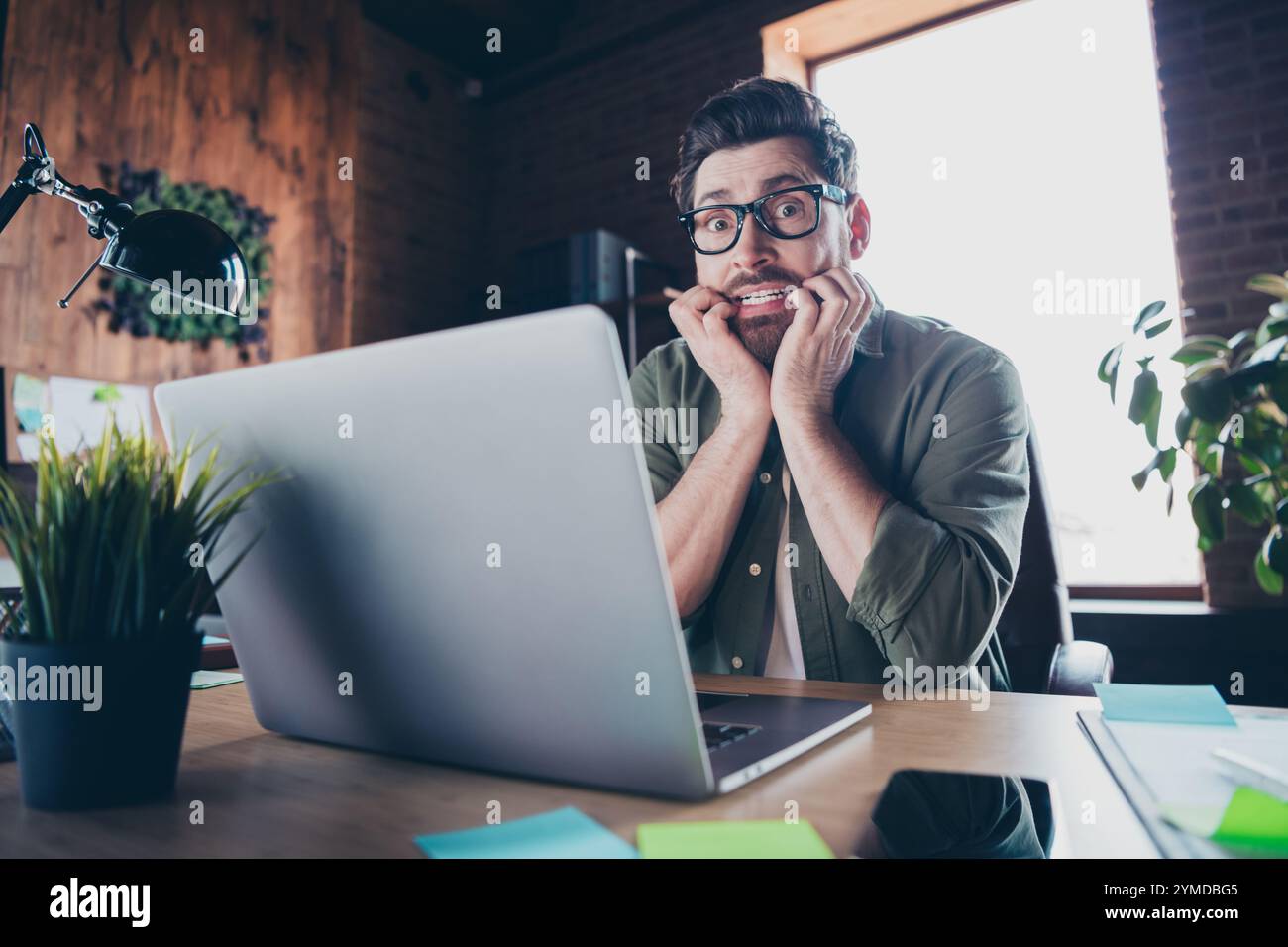 Photo of funky scared boss wear shirt biting fingers working modern ...