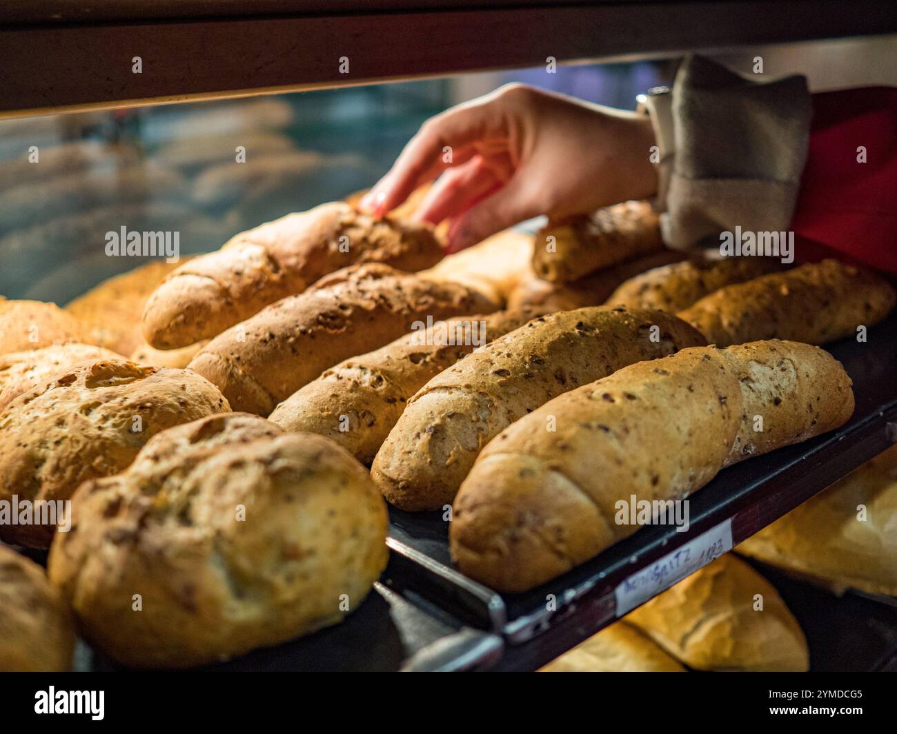 Bakery Baker bread croissant fresh food Stock Photo - Alamy