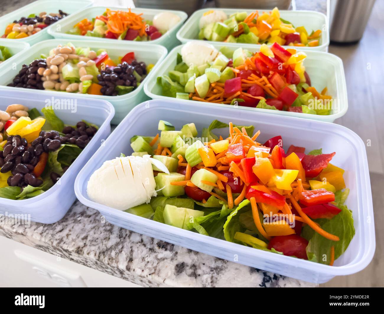 Meal Prep with Colorful Salads in Containers Stock Photo - Alamy
