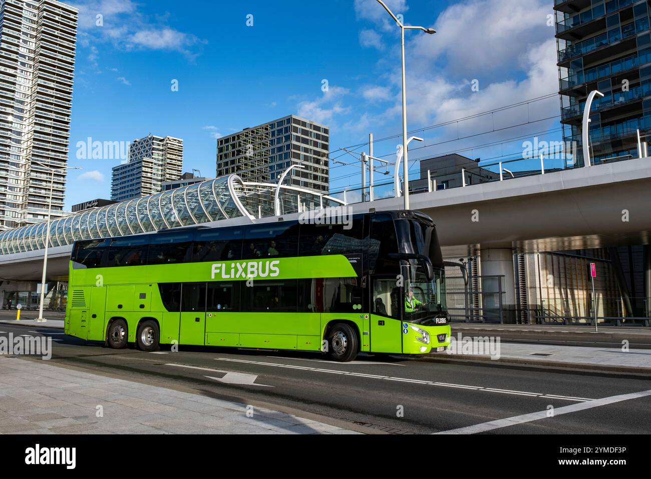 The Hague, Netherlands, Central Station - 17 November 2024: A green bus ...