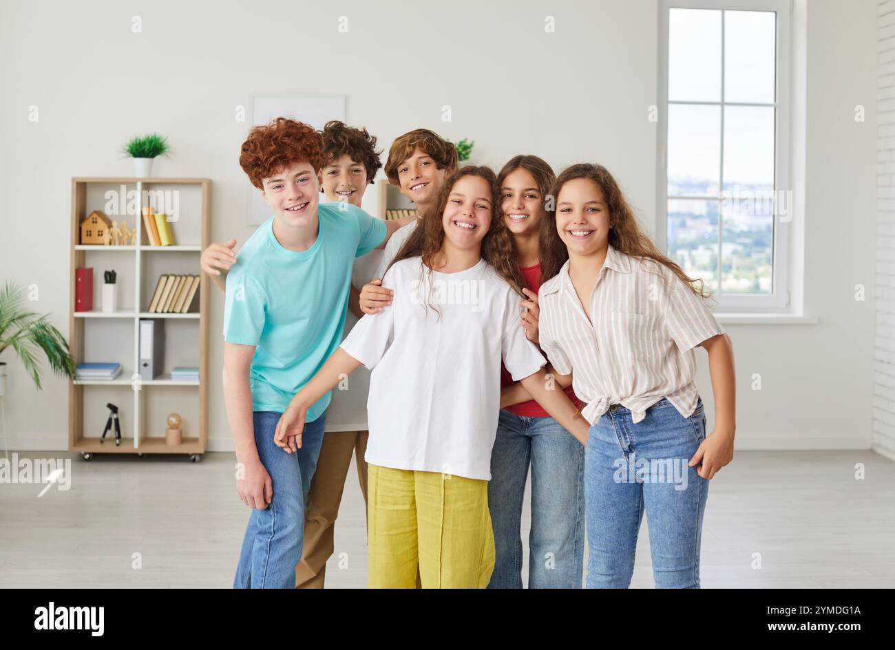 School children laughing group unity, young student friends and ...