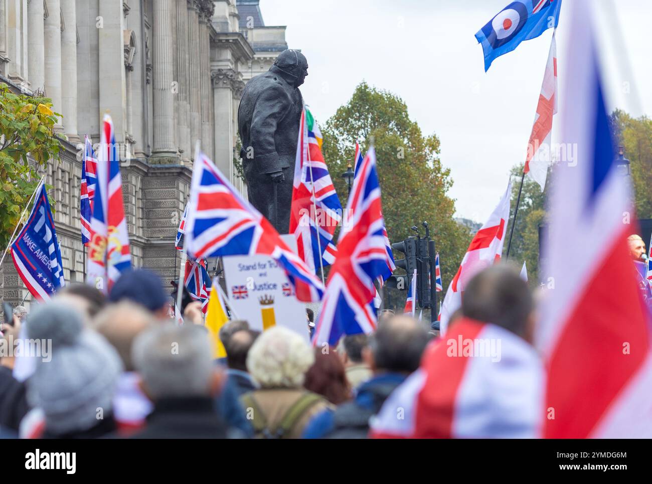 Tommy Robinson supporters gather and march for their Unite the Kingdom ...