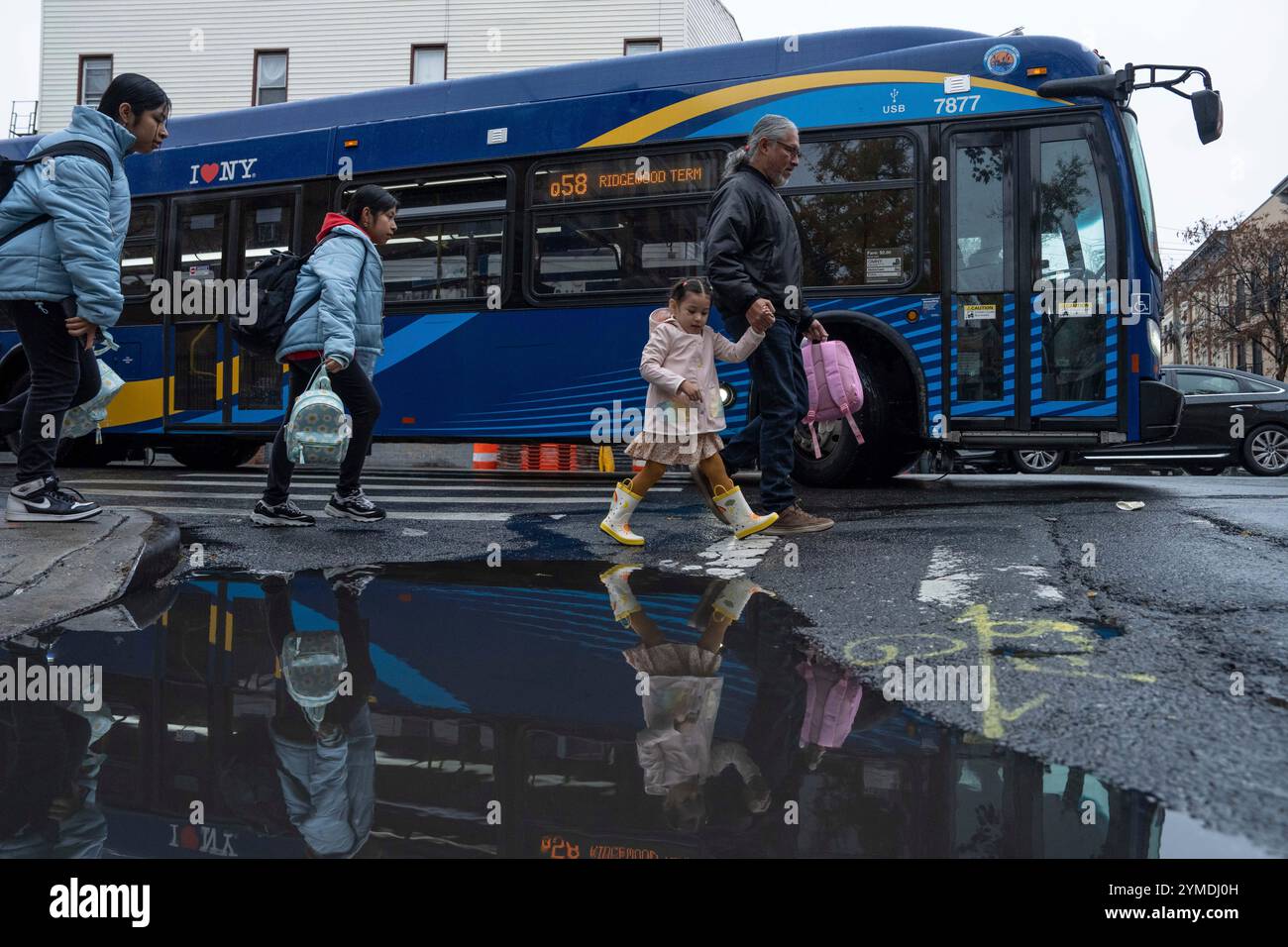 Javier Rodriguez walks his daughter Eleanor Rodriguez, 3, to school ...