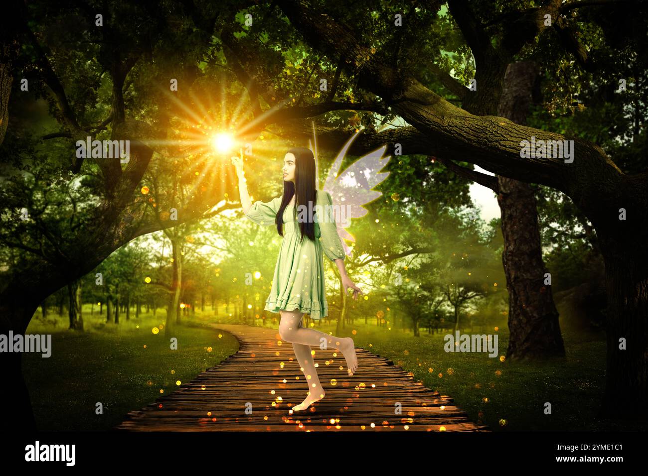 Enchanting fairy touching magic light among trees. Mesmerizing girl ...