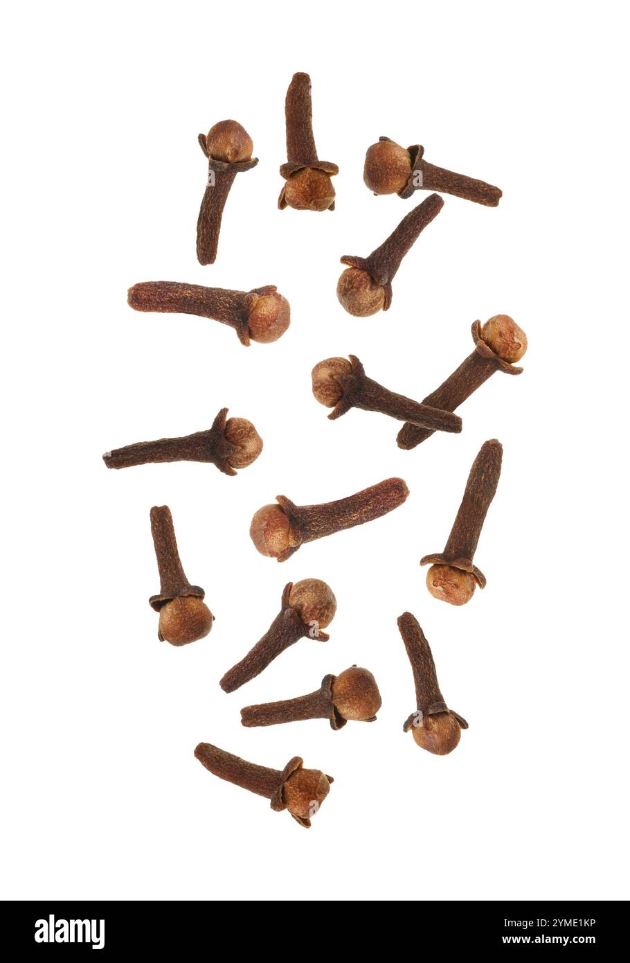 Clove buds in air on white background. Aromatic spice Stock Photo - Alamy