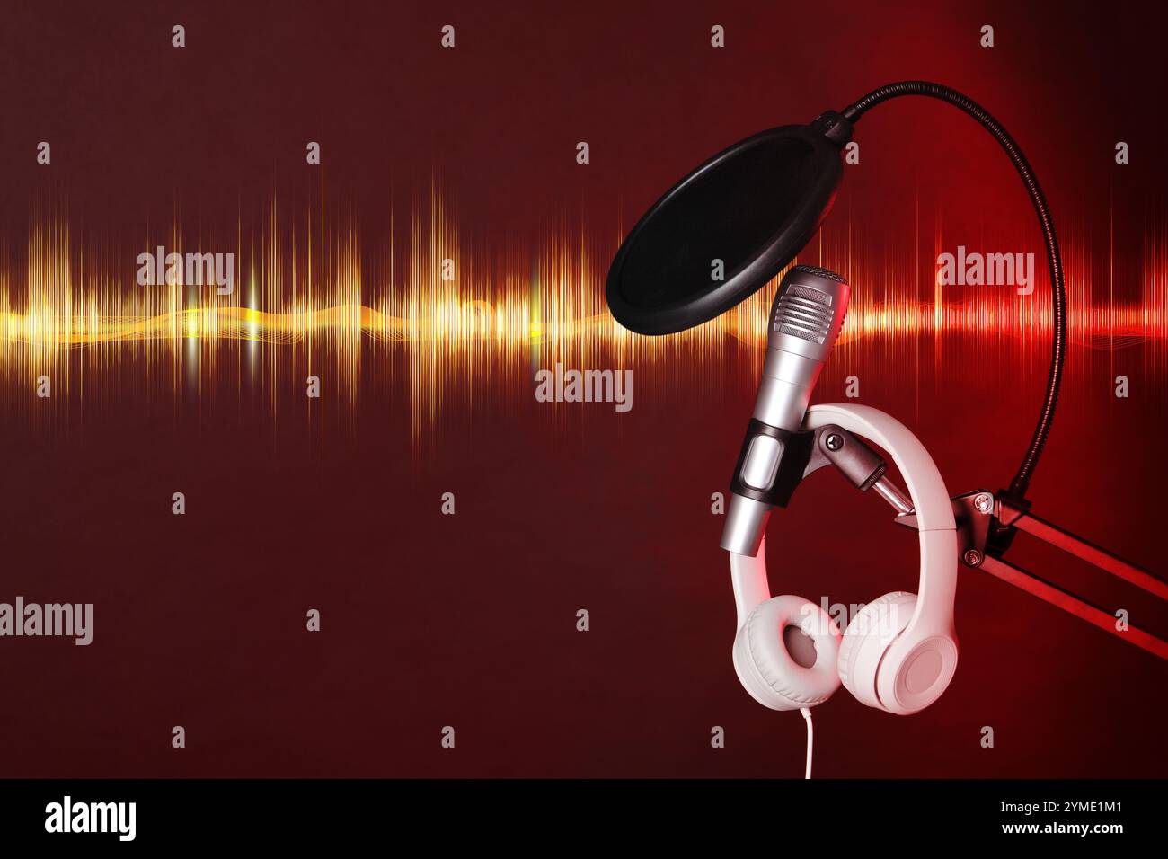 Sound wave, microphone, headphones and pop filter on red background ...