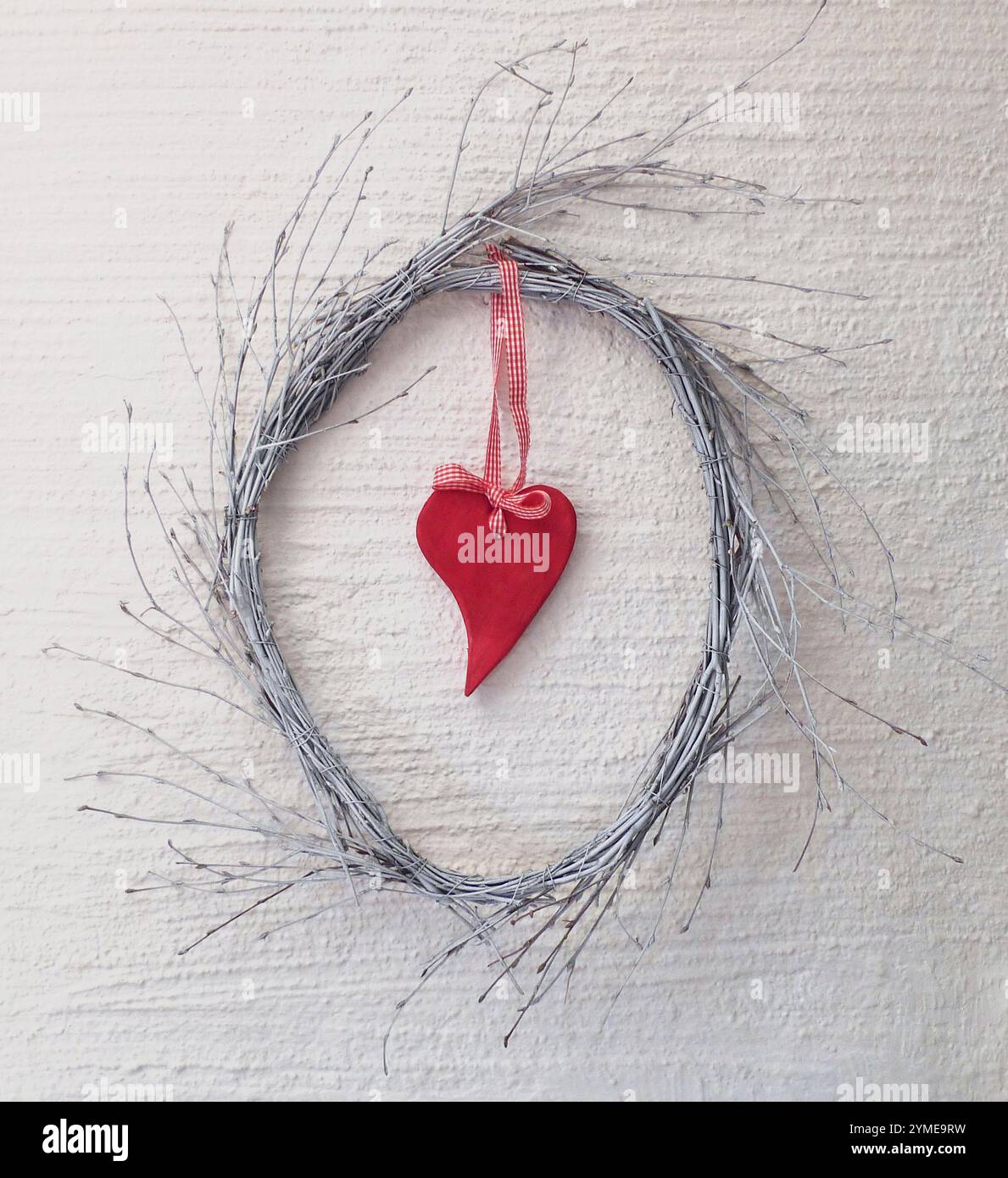 Birch wreath with wooden heart Stock Photo - Alamy