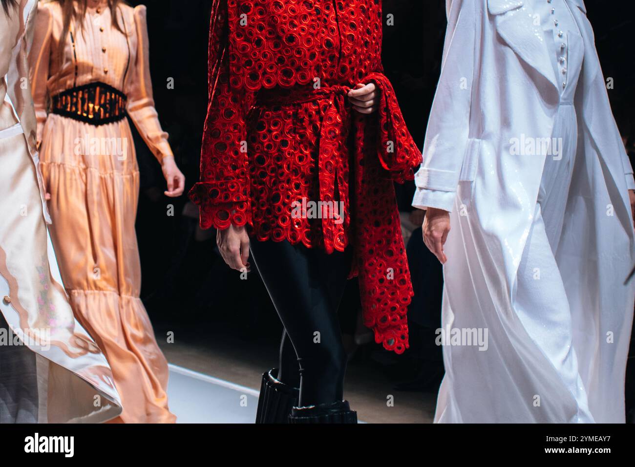 Bright red jacket, long white beige dresses, fashion cloth concept ...