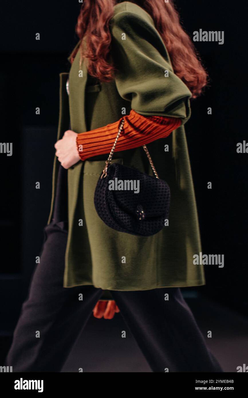 Green sweater and black pants hi-res stock photography and images - Alamy