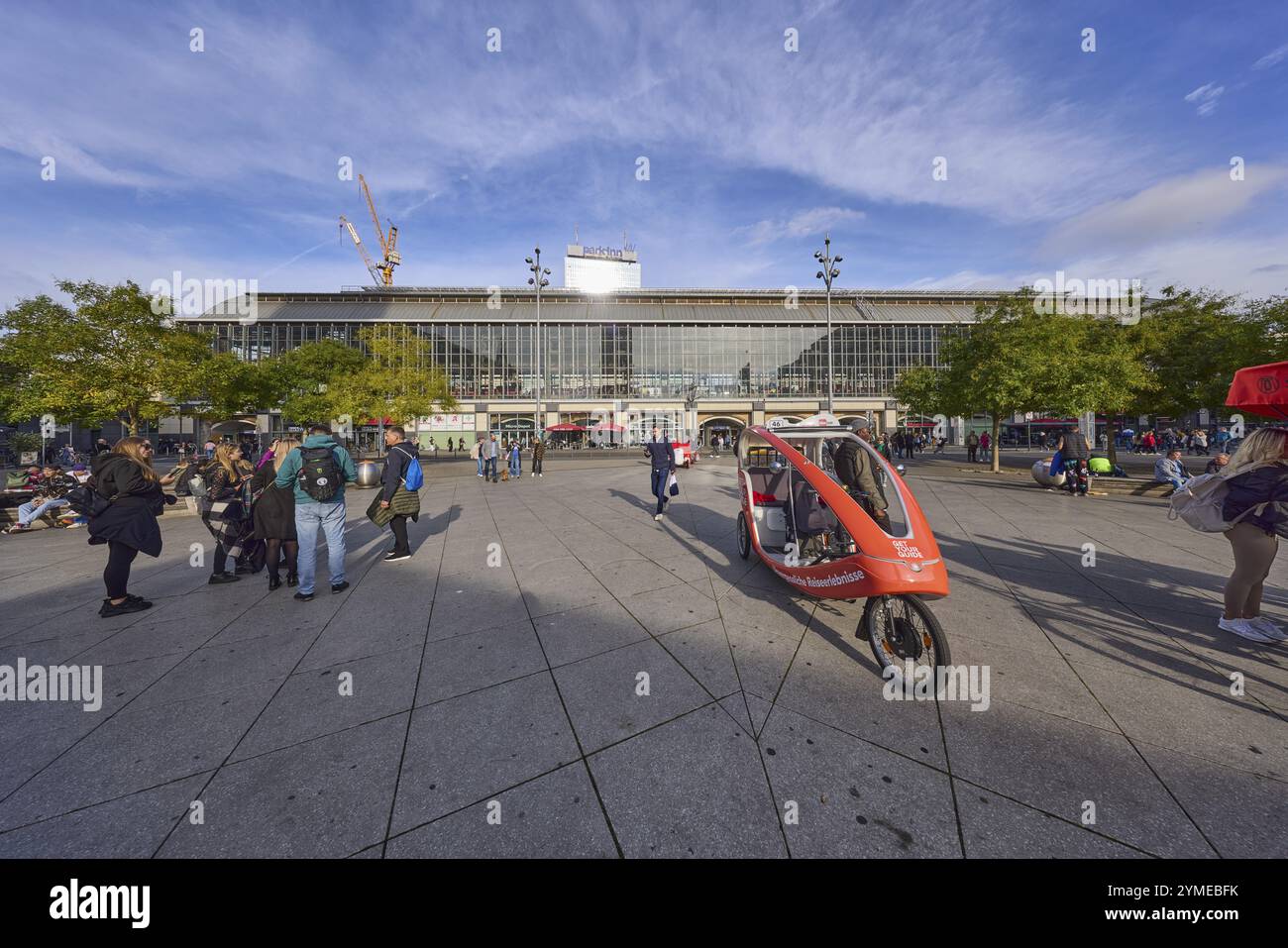 Berlin TV Tower and Alexanderplatz railway station with rickshaw for tourist city tours ...