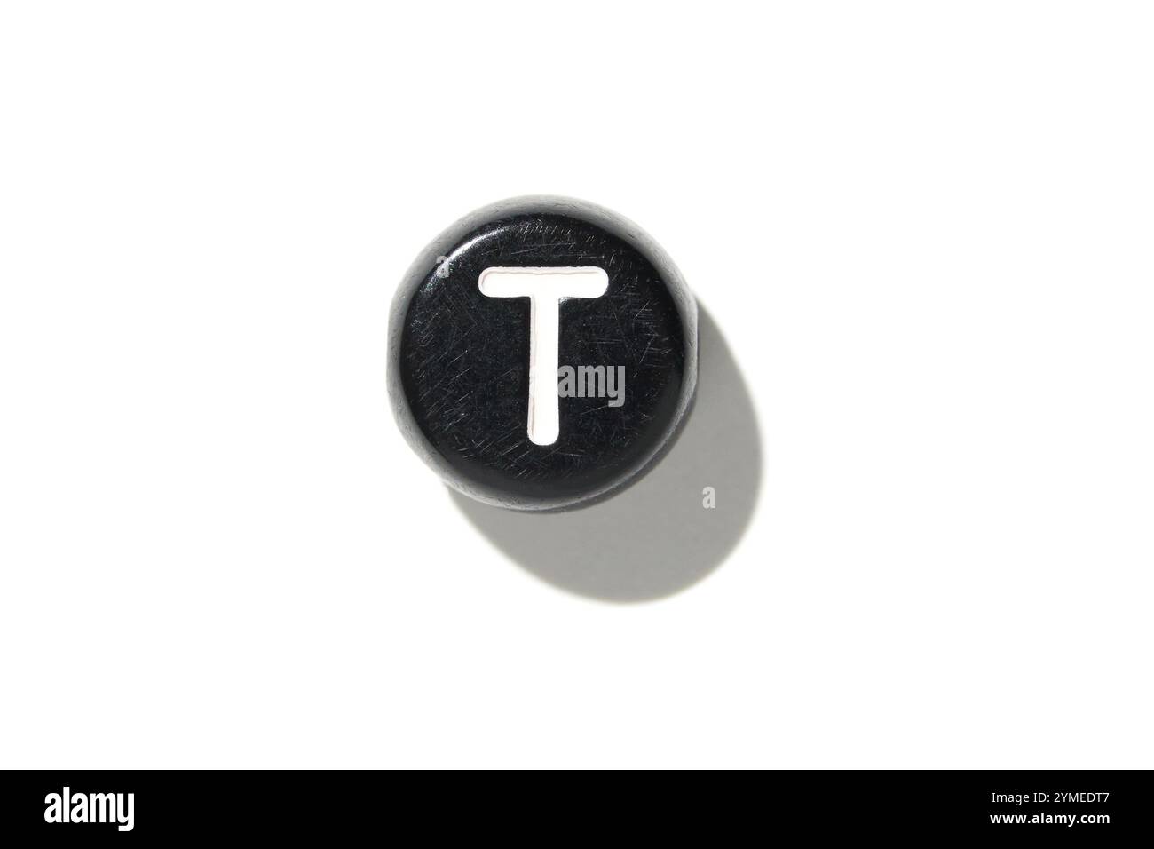 Vintage black keyboard key with letter t on white background ...