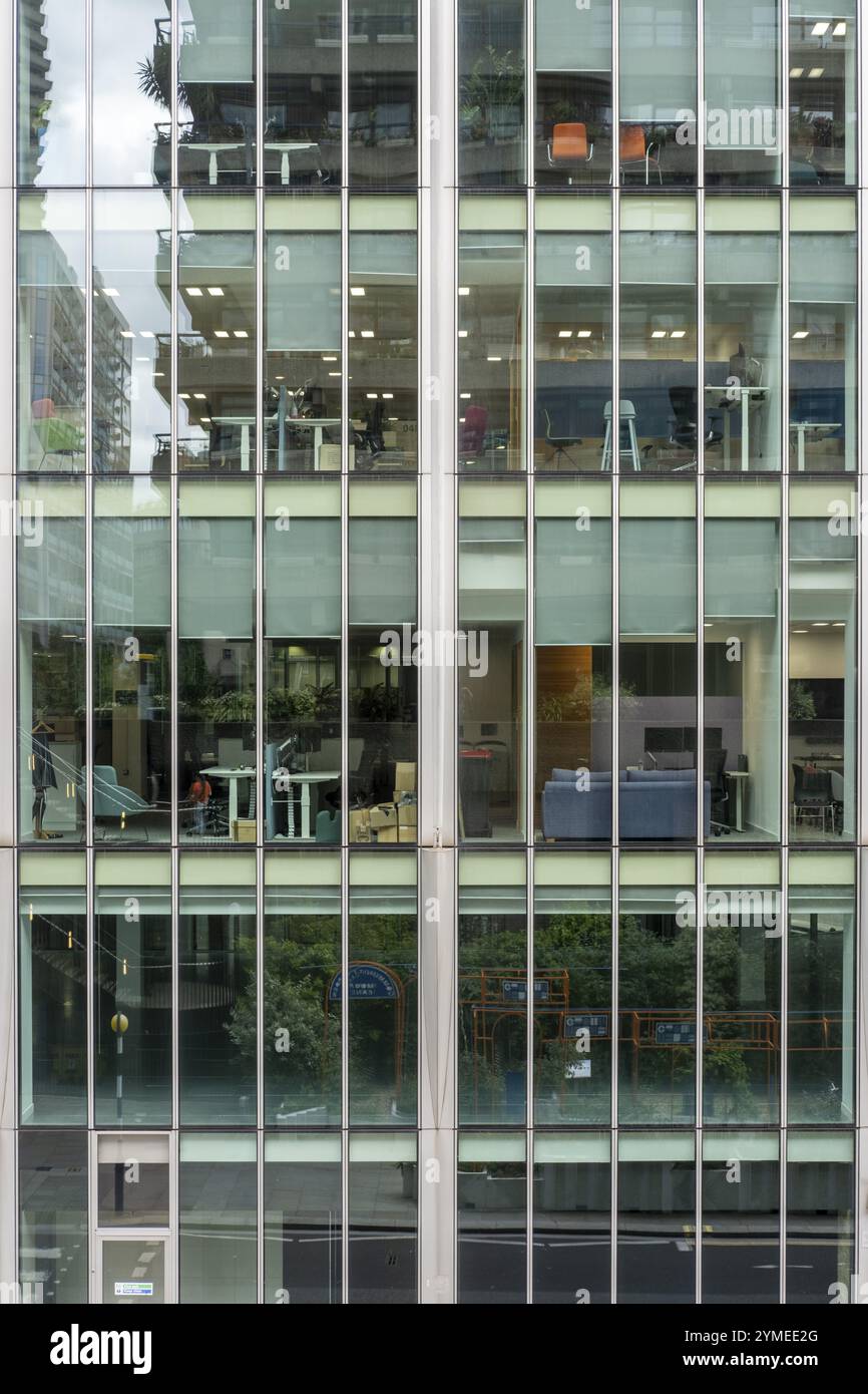 View through glass walls of a modern office building, revealing ...