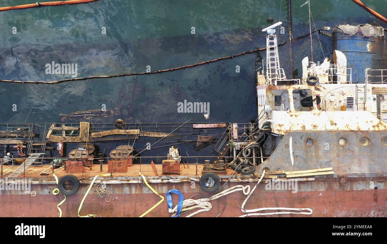 Pollution of the World Ocean. Top view of the deck of the sunken ship ...