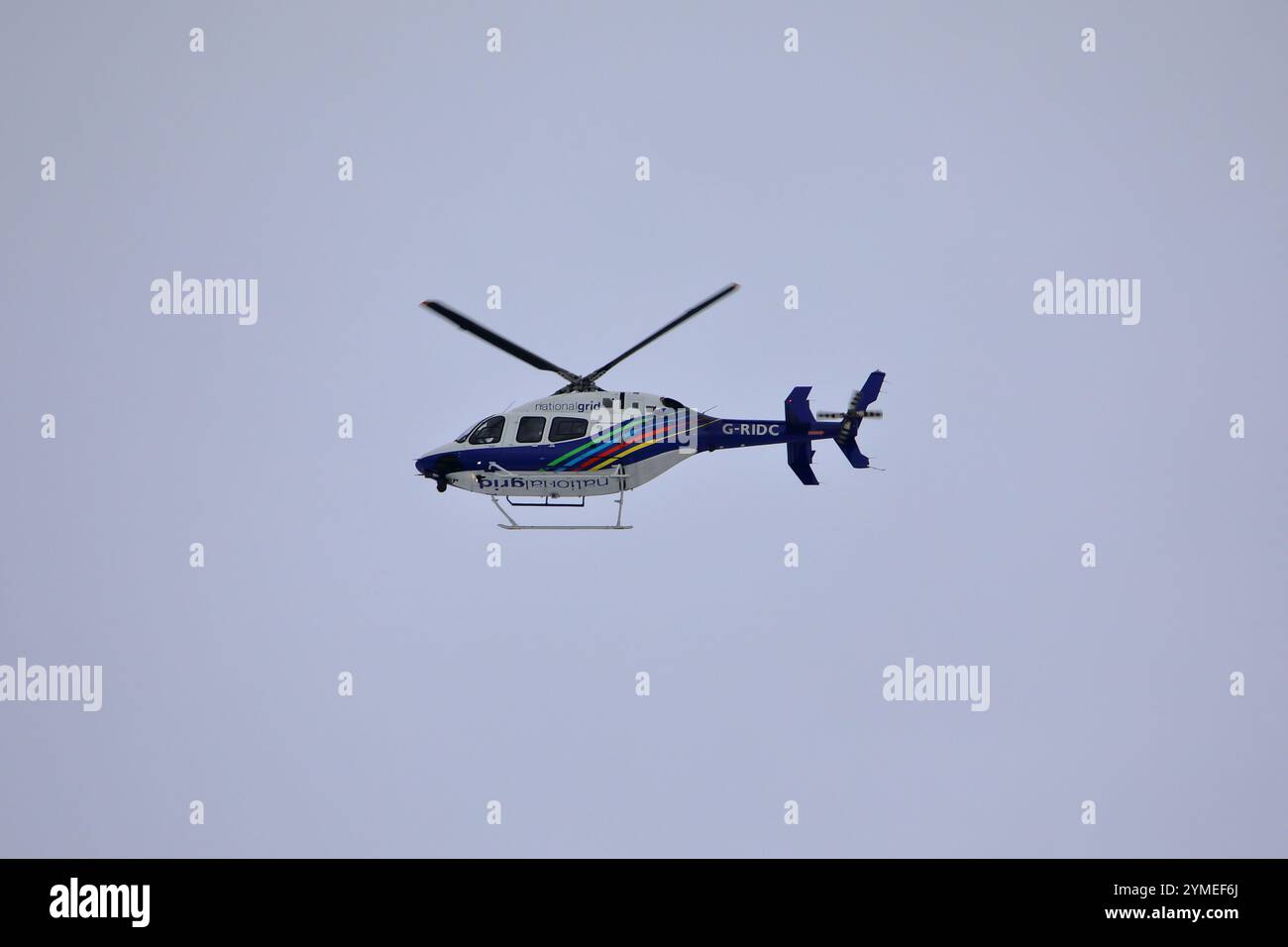 a national grid helicopter in flight Stock Photo - Alamy