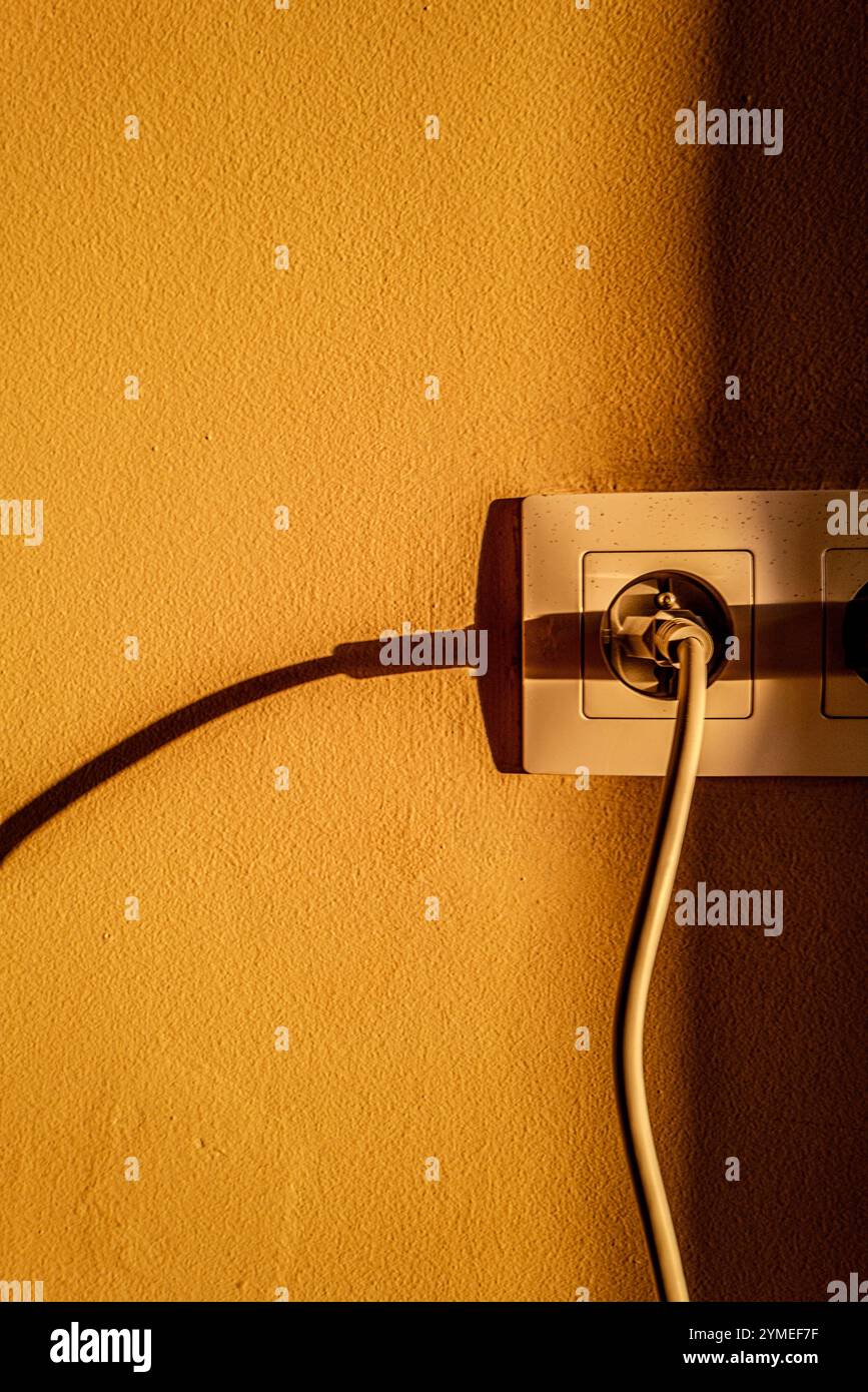 device plugged into an electrical socket Stock Photo - Alamy