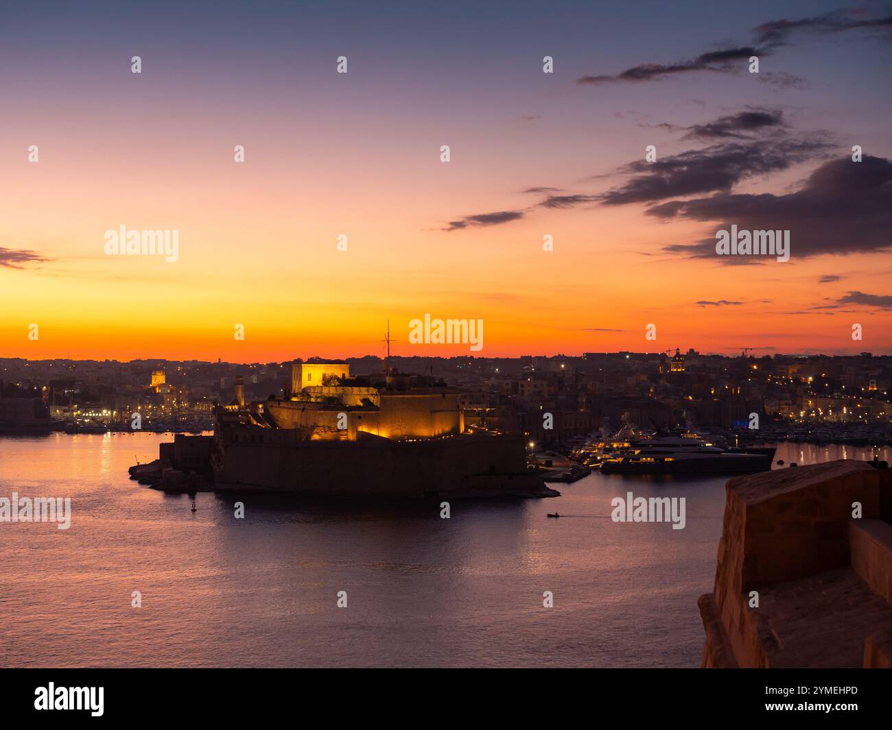 View of the three cities and Grand harbour at sunset from Valletta ...