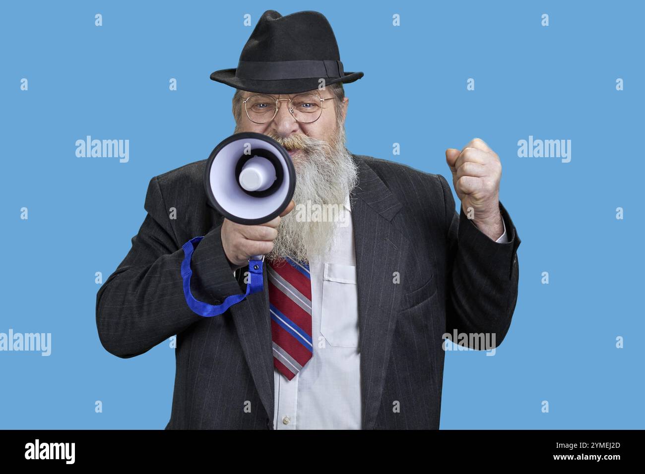 Portrait of charismatic old man giving a speech in megaphone. Isolated ...