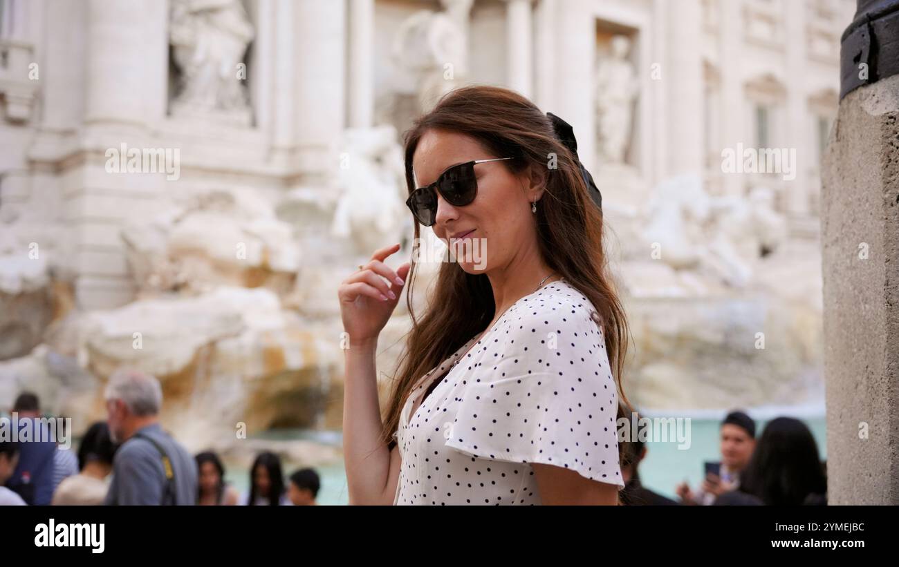 Trevi fountain rome and posing hi-res stock photography and images - Alamy
