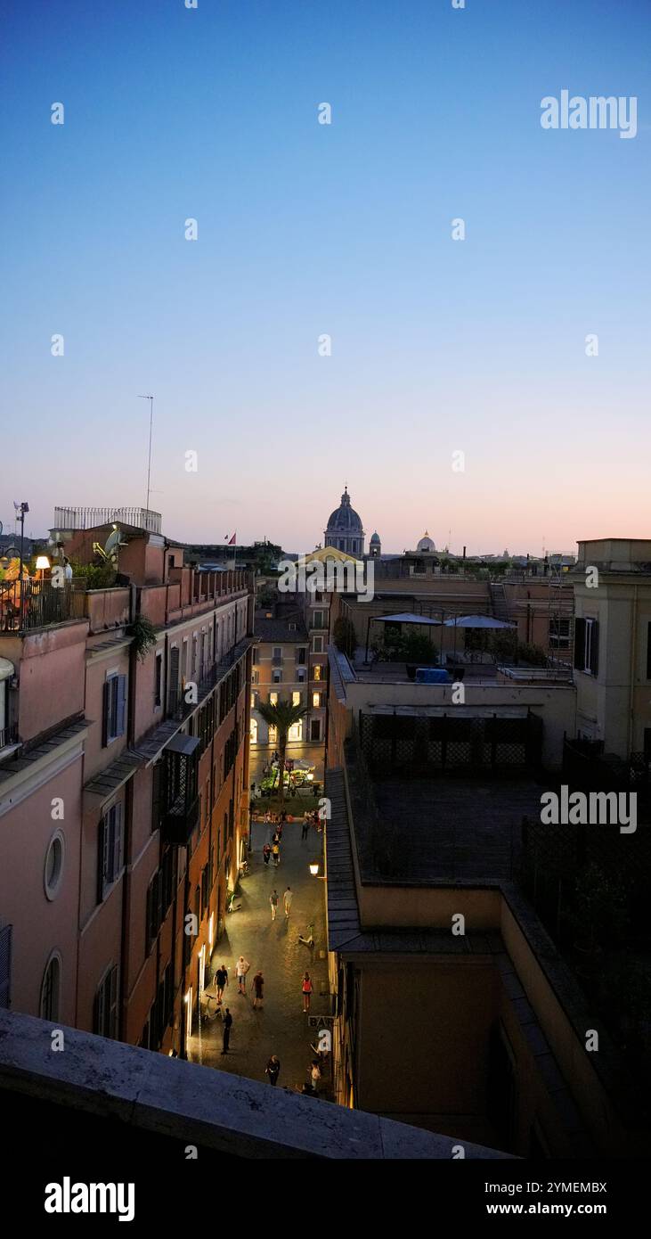 Scenic Rooftop View of Rome at Sunset with City Lights and St Peters ...