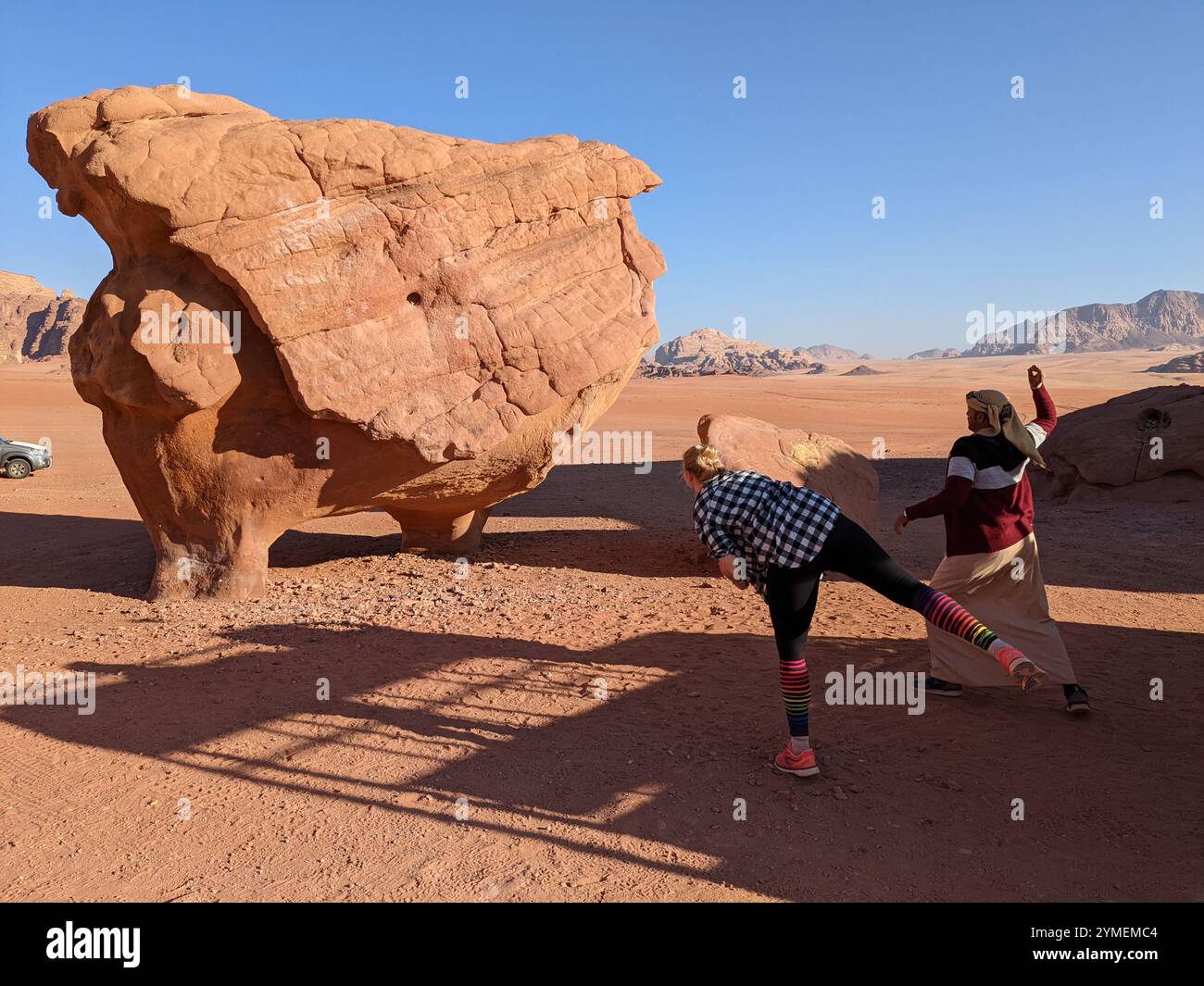 Wadi Rum Desert, Jordan. The red desert and Jabal Al Qattar mountain ...