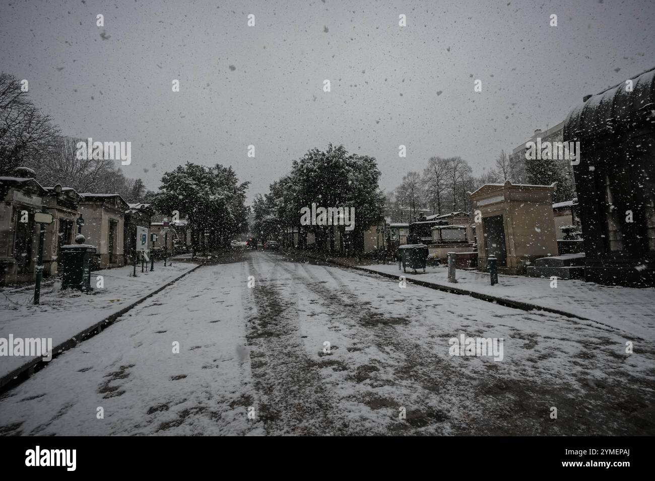 Snowfall at Père-Lachaise cemetery, which was closed to the public this ...