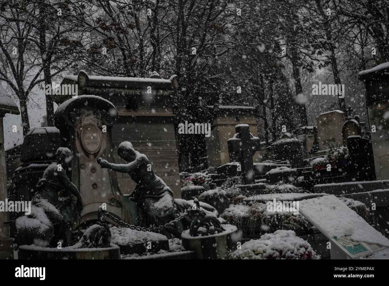 Snowfall at Père-Lachaise cemetery, which was closed to the public this ...