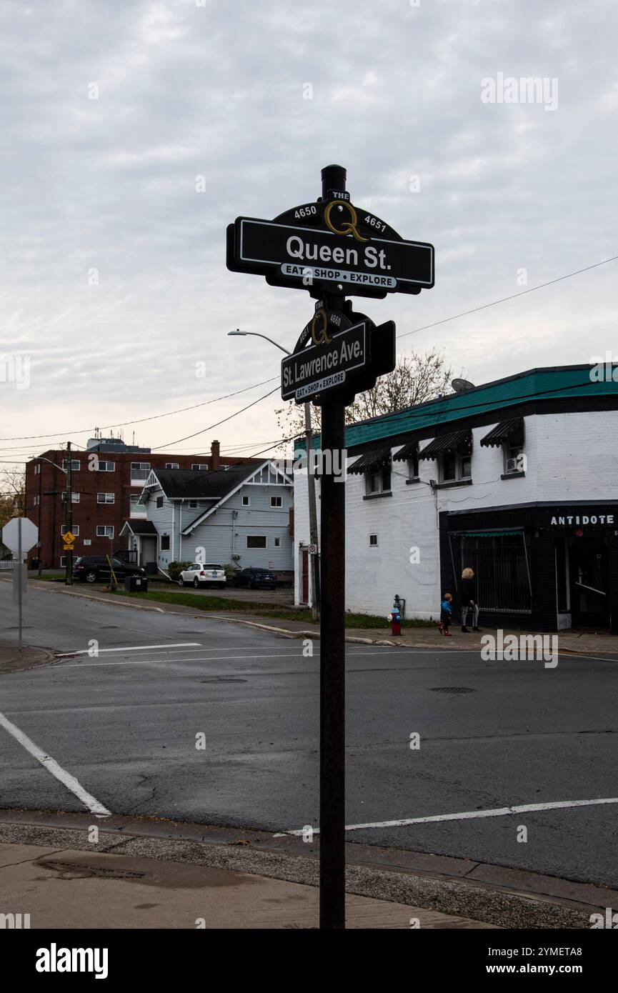 The Q Queen Street and St. Lawrence Avenue signs at Queen Street ...