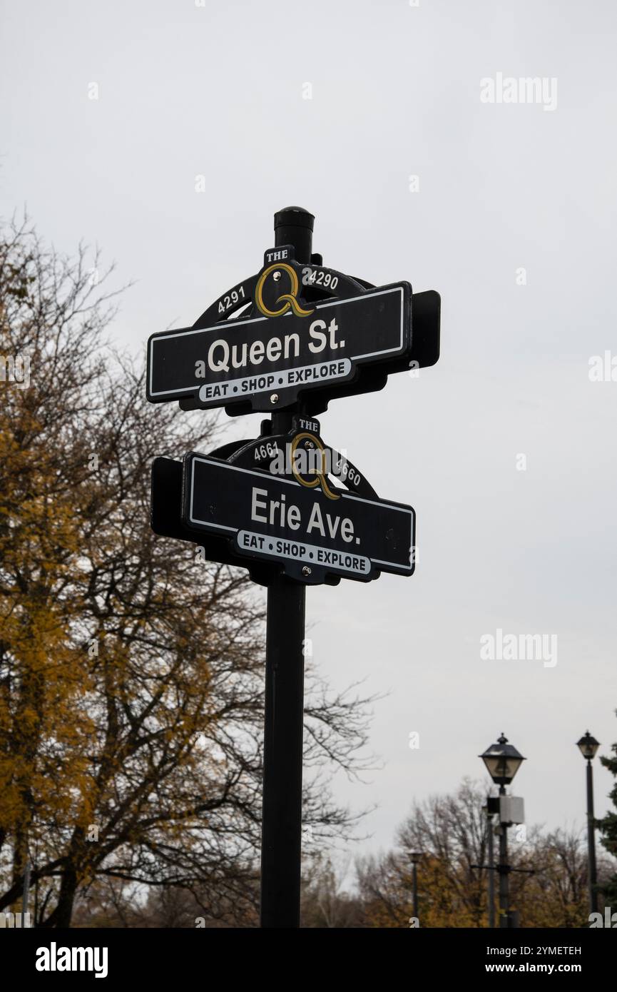 The Q Queen Street and Erie Avenue signs at Queen Street District in ...