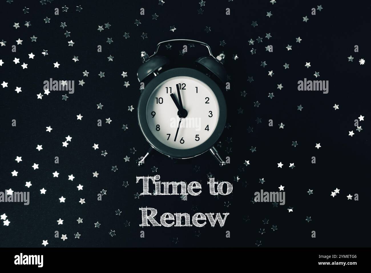 Black and white photo of a clock with the words Time to Renew Stock ...